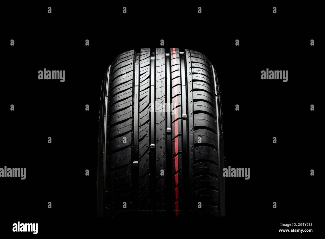 new summer tire, tread close-up on black background Stock Photo - Alamy