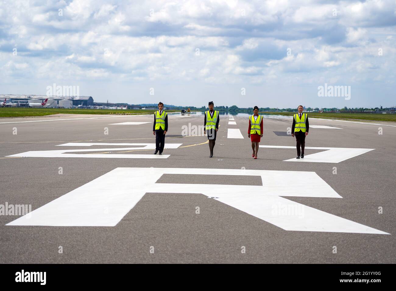 Flight crew from British Airways and Virgin Atlantic walk on a closed ...