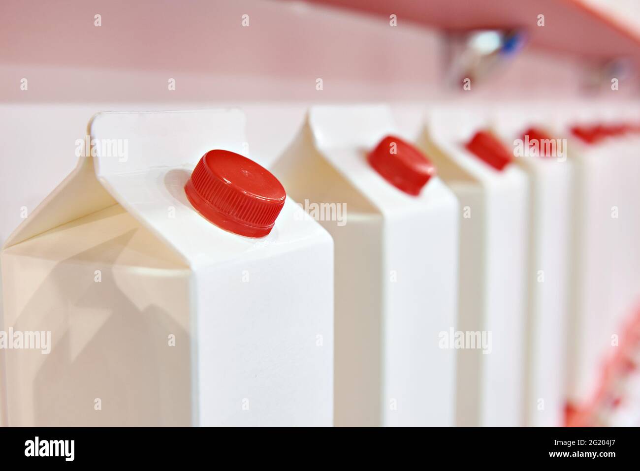 Packaging for pasteurized dairy products Stock Photo - Alamy