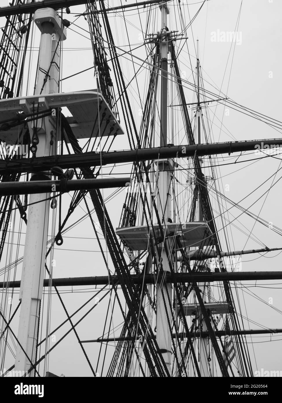 Monochromatic image of a bunch of tall masts Stock Photo - Alamy