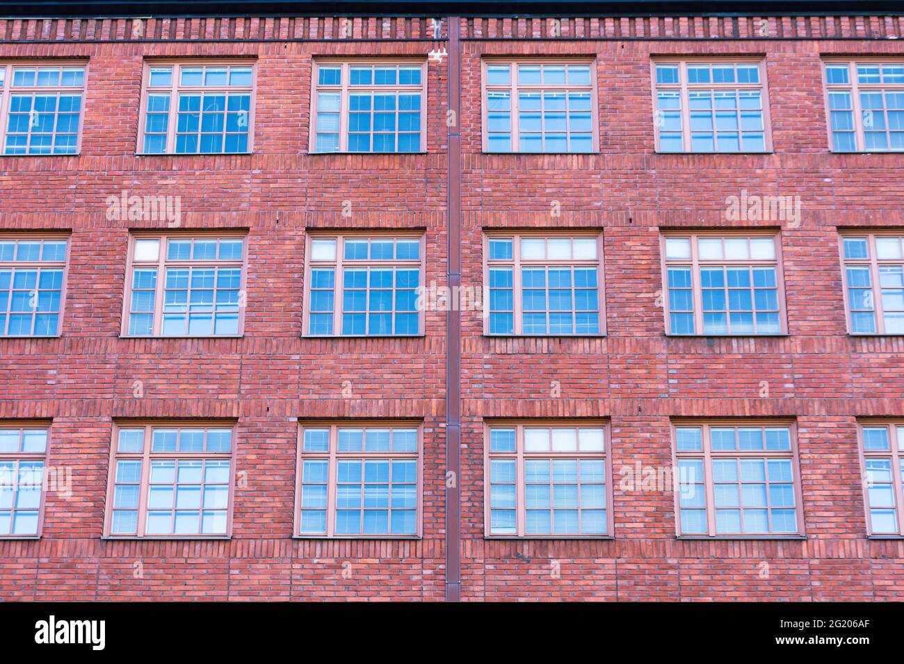 Facade of the building with large lattice windows Stock Photo - Alamy