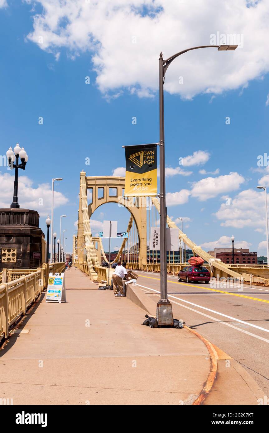 The Roberto Clemente bridge that connects downtown Pittsburgh ...