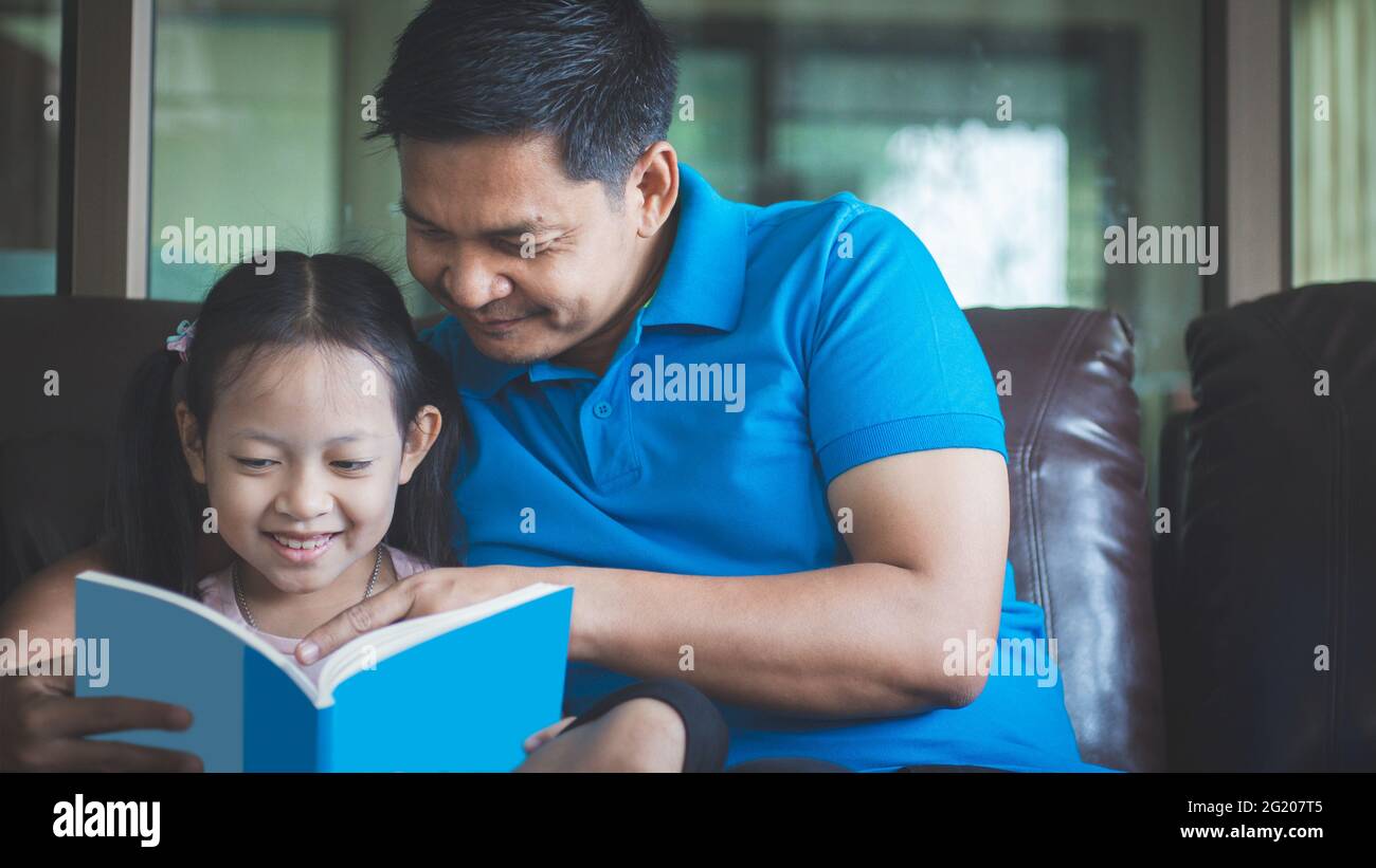 Daughter helping father work hi-res stock photography and images - Alamy