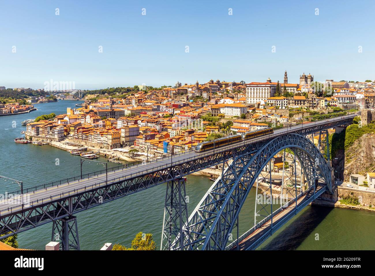 Beautiful panorama of city of Porto with metro on famous bridge ...