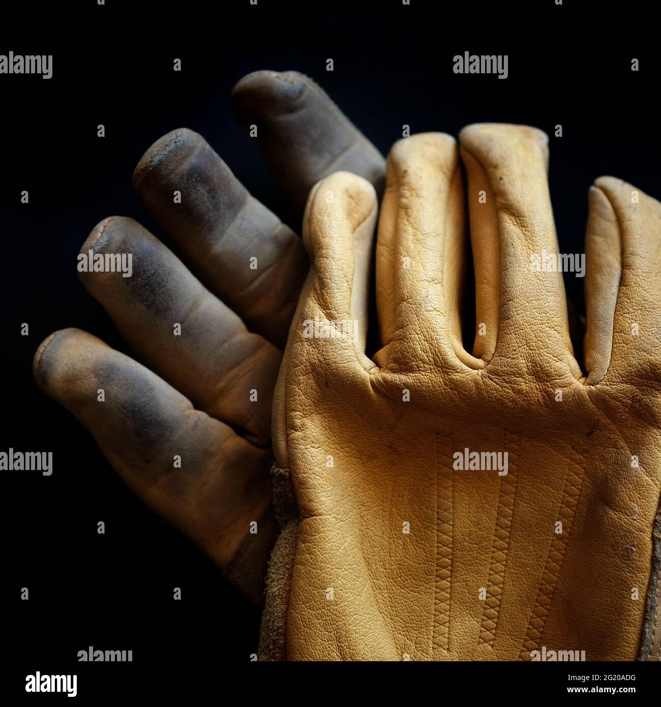 Detail of old worn leather work gloves workgloves texture Stock Photo ...