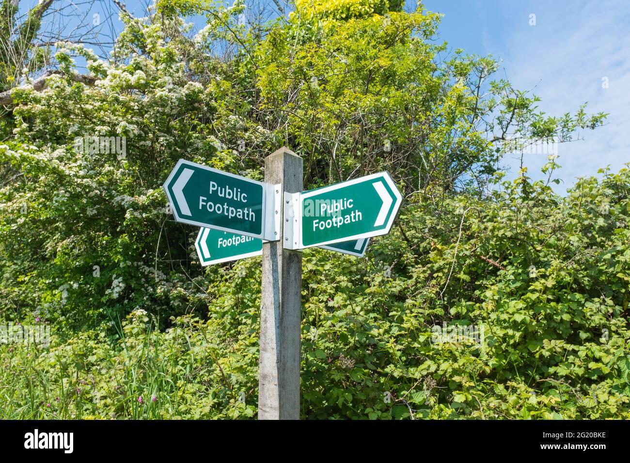 Public footpath sign pointing in four directions in Salcombe, South ...