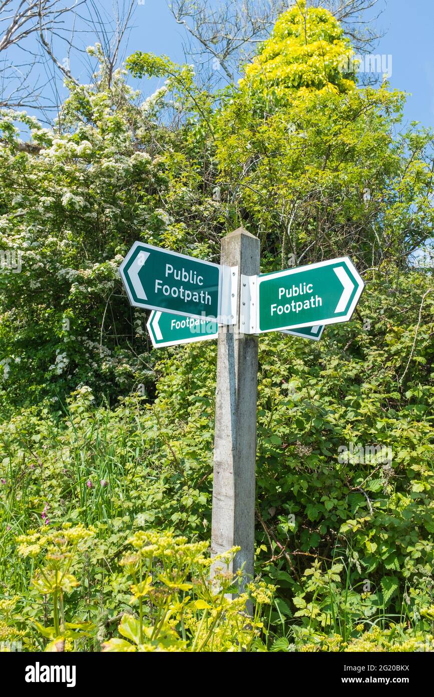 Public footpath sign pointing in four directions in Salcombe, South ...