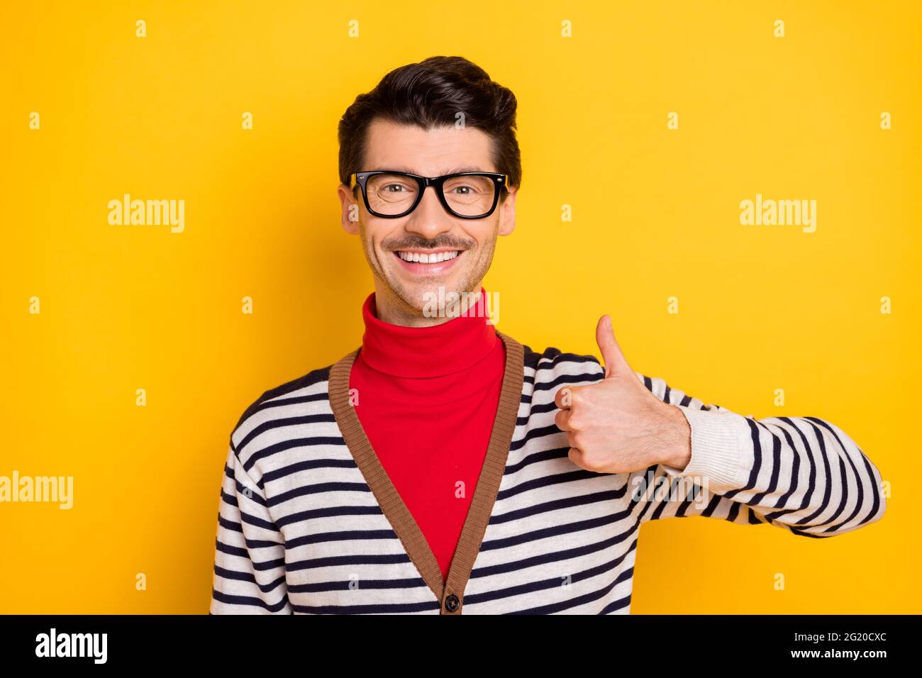 Photo of young cheerful man happy smile show thumb-up like cool advert ...