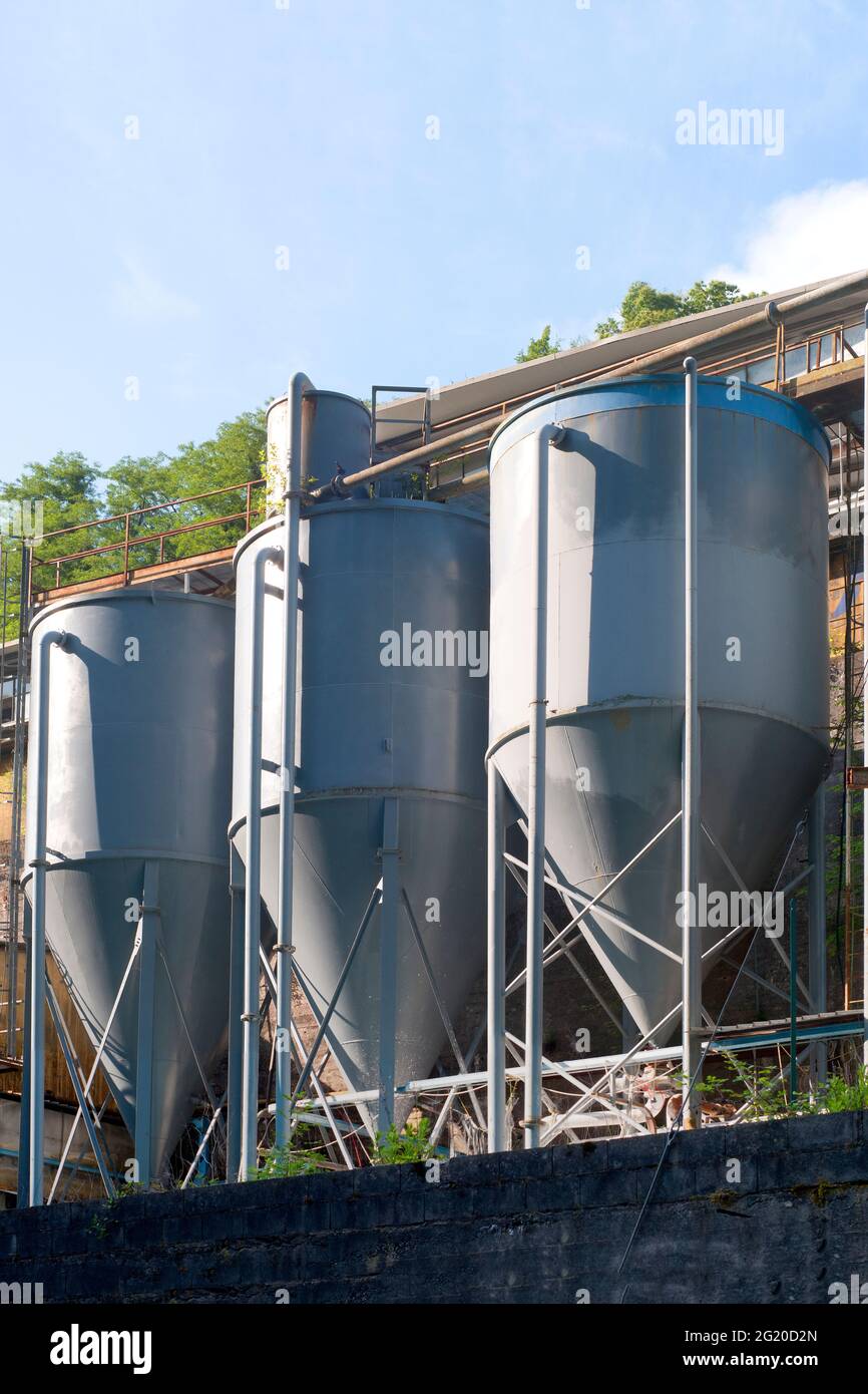 Large metal silos for the storage of waste from marble processing Stock ...