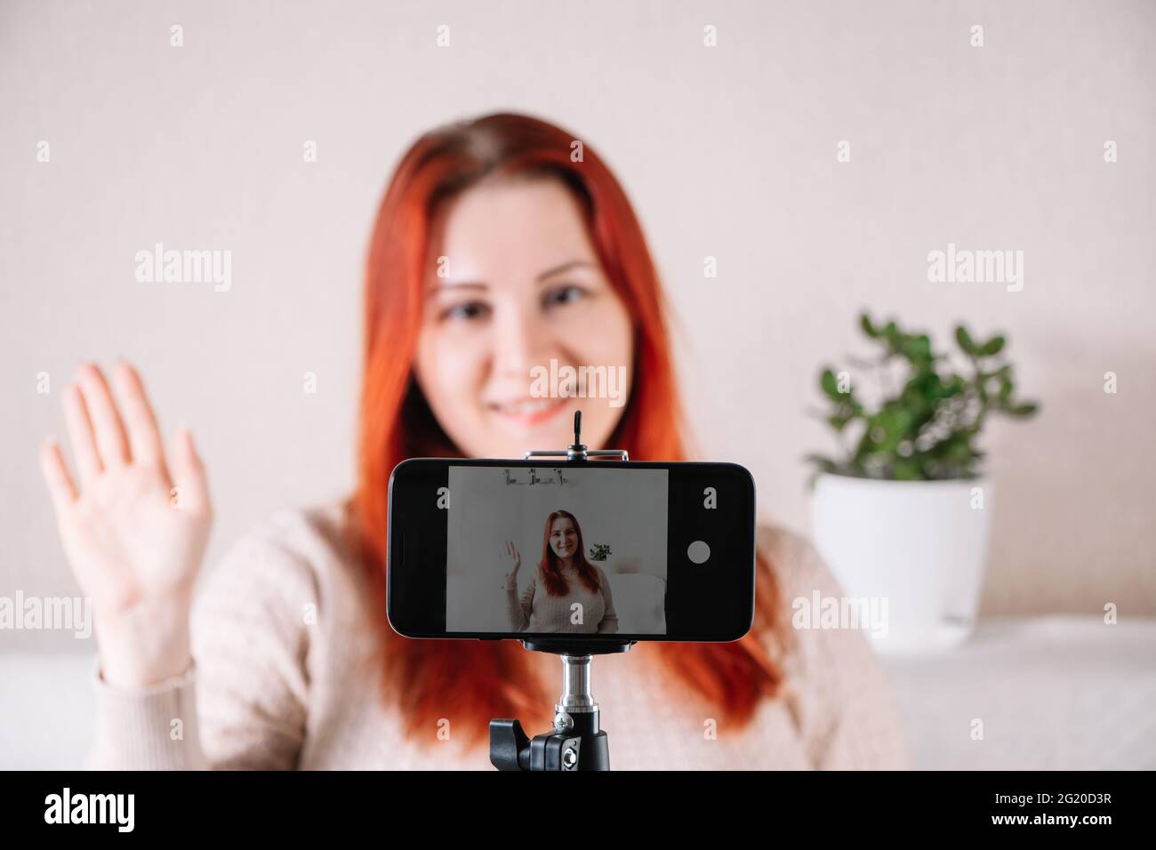 Caucasian female influencer recording hi-res stock photography and ...