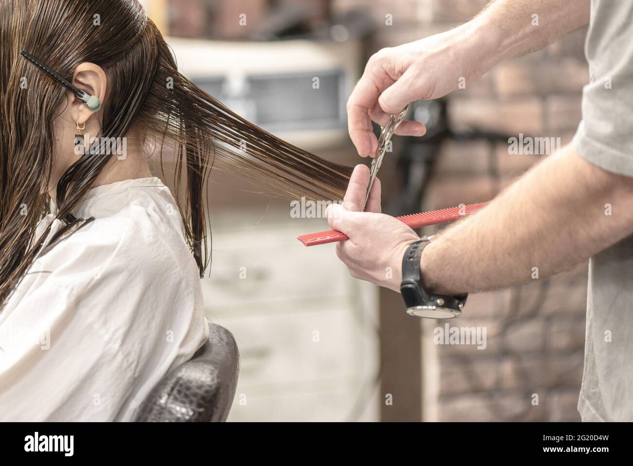 Girl hair cut scissors hi-res stock photography and images - Alamy