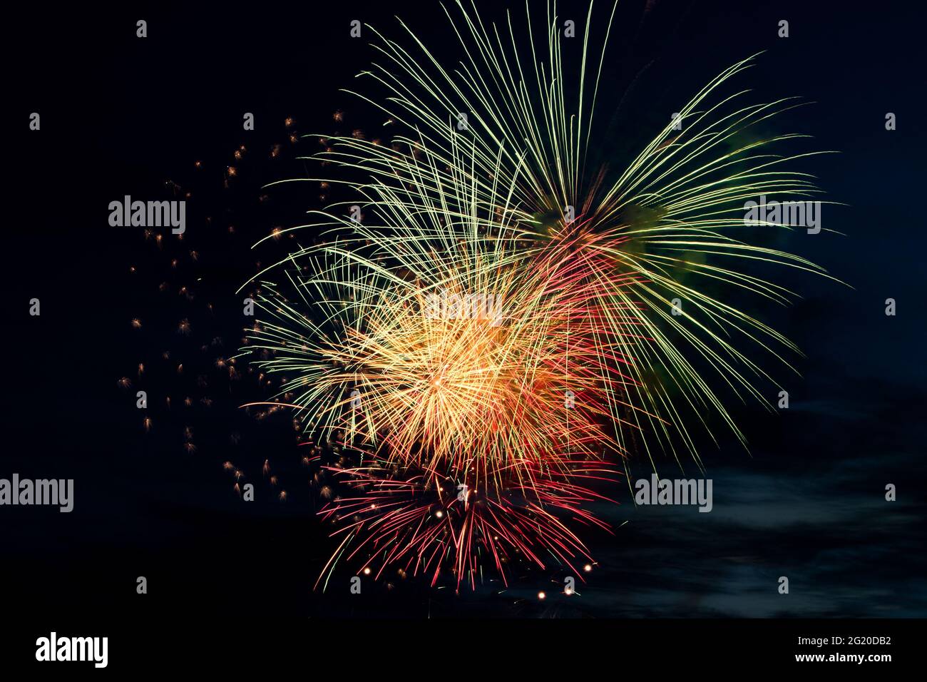 Bright colored fireworks on a black background. Celebration and ...