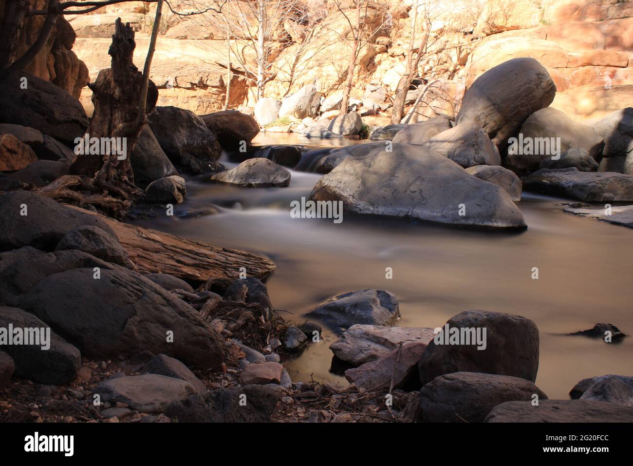 creek slow flow water colorado sunset Stock Photo - Alamy