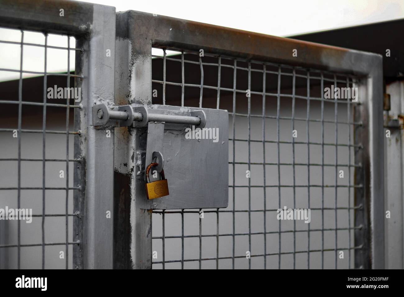 SINGAPORE, SINGAPORE - Mar 11, 2021: Locked and rusted padlock on a ...