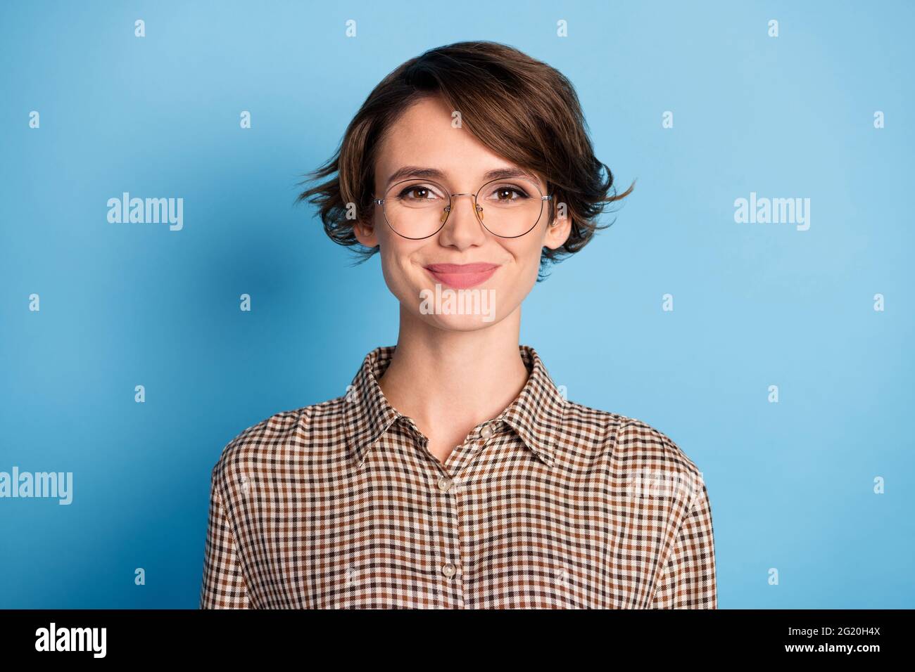 Photo of attractive happy pretty young woman wear glasses smile ...