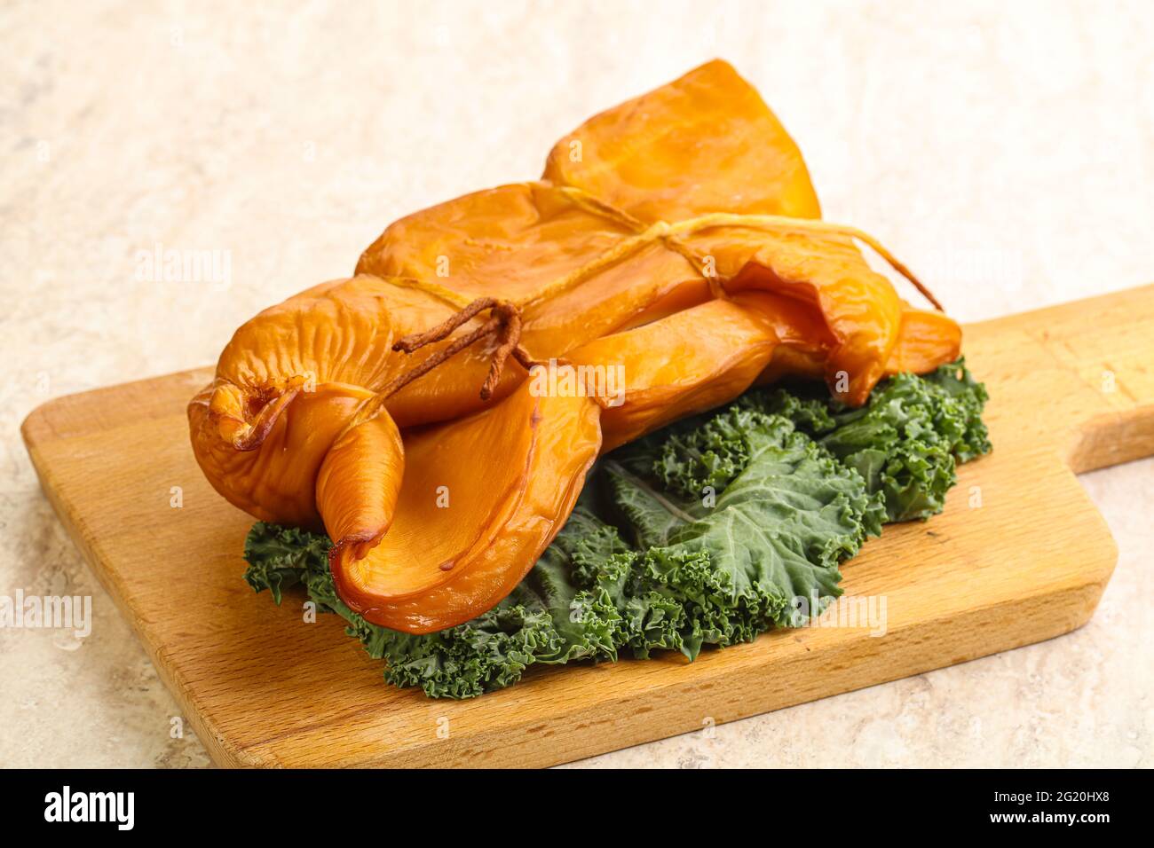 Smoked squid calamar appetizer snack isolated Stock Photo - Alamy