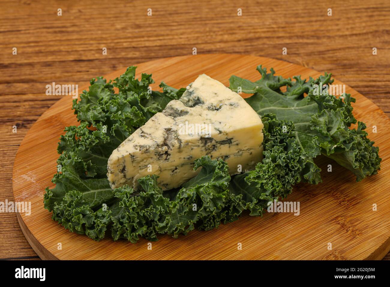 Dairy Blue cheese triangle with mold Stock Photo - Alamy