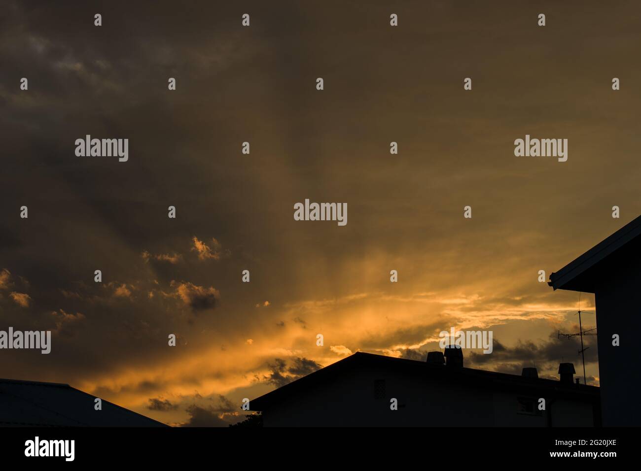 Sunset over roof tops hi-res stock photography and images - Alamy