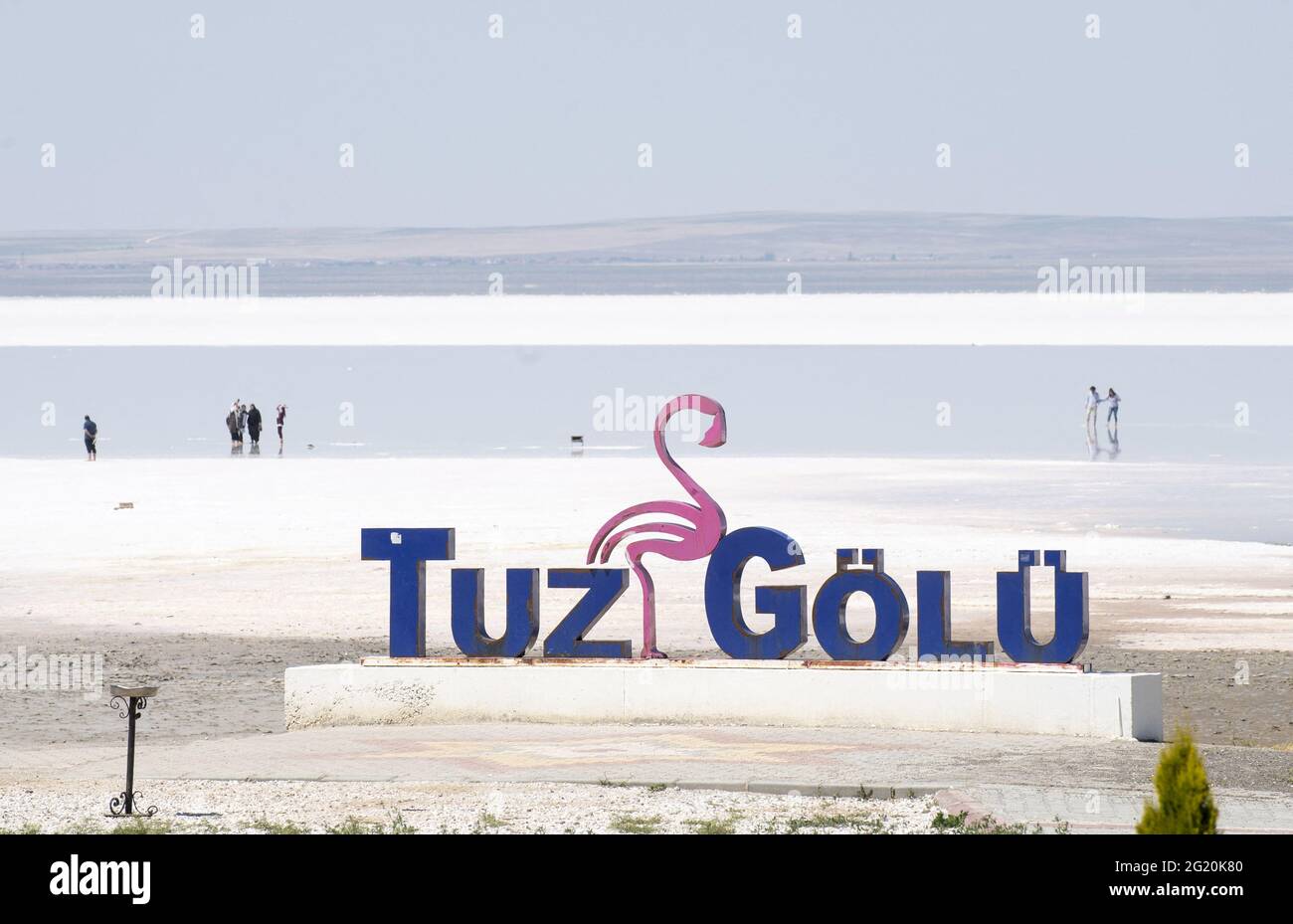 People walk in Salt Lake (Turkish: Tuz Golu), near Cappadocia, Turkey ...