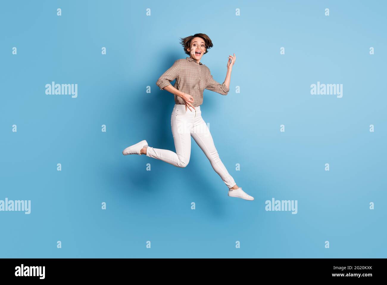 Full size portrait of cheerful person jump high hands playing imagine ...