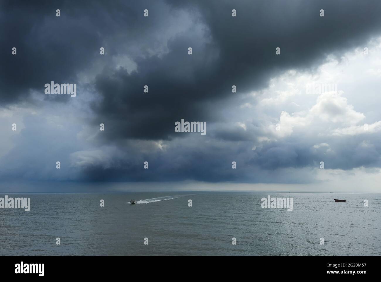 Weather cloudy and rainy on ocean storms and fishing boat on a middle ...