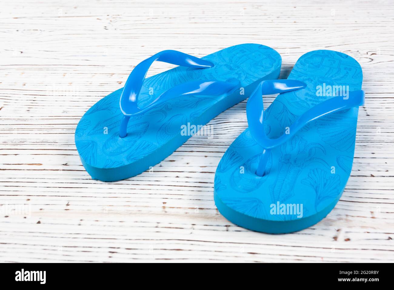 Blue plastic slippers hi-res stock photography and images - Alamy