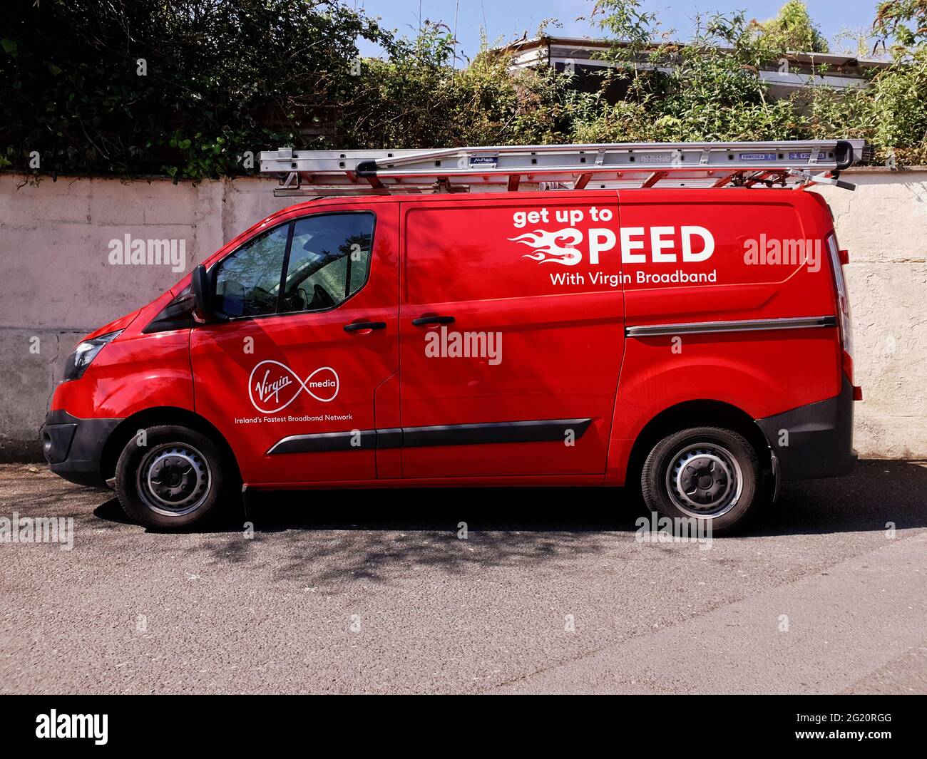 BRAY, IRELAND - Apr 17, 2021: Virgin Media redvan parked in the street ...