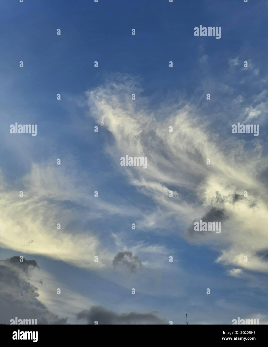 Natural view of the beautiful skyline with clouds in a blue background ...
