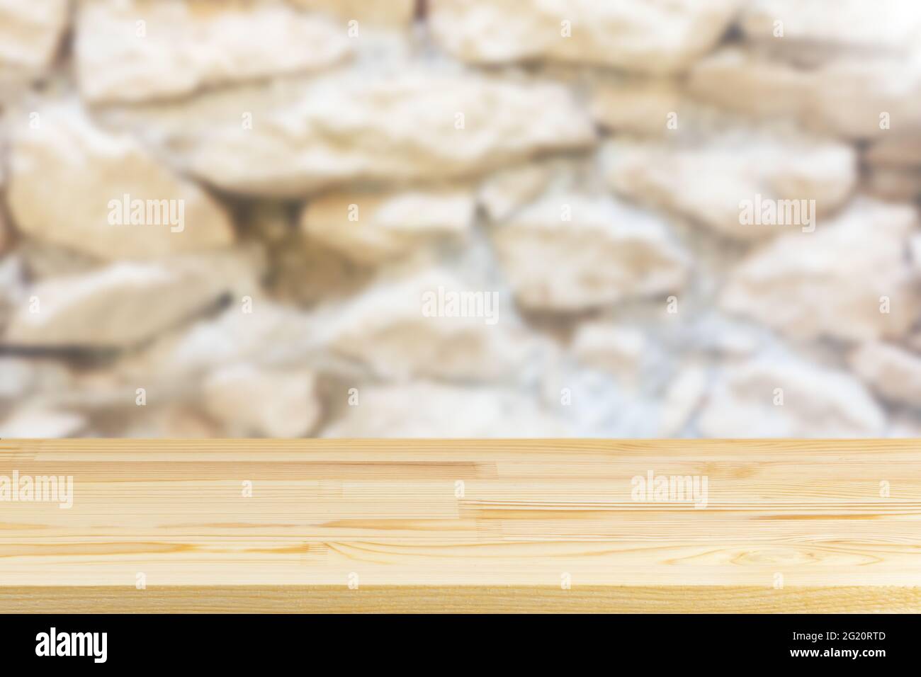 wood table top on blur stone wall background Stock Photo - Alamy