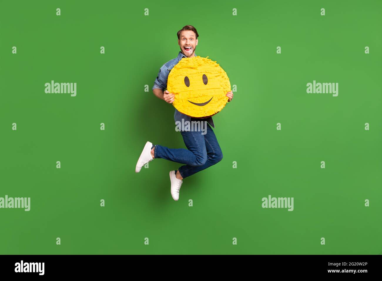 Full length body size photo of happy funny guy jumping up keeping ...