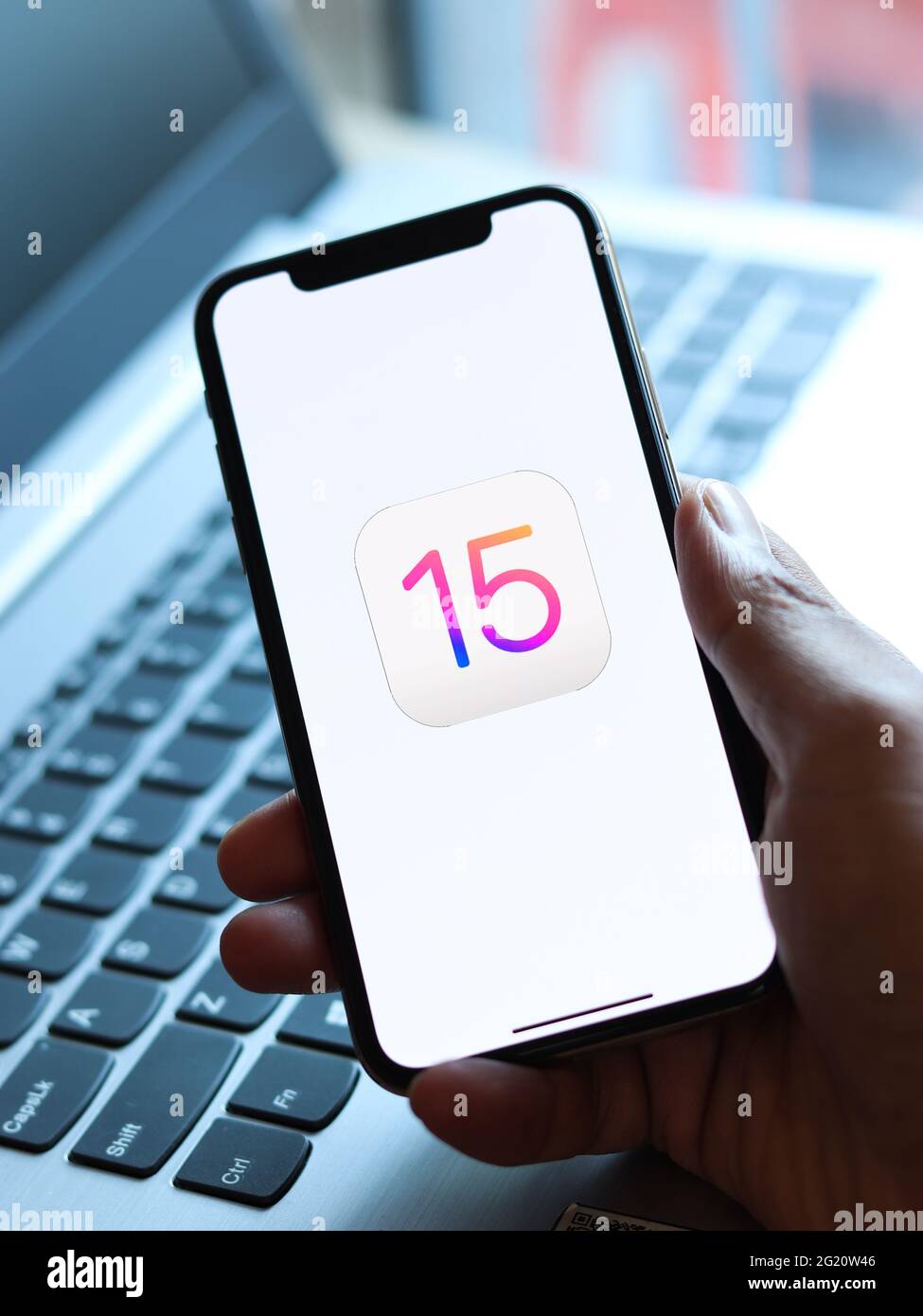 Assam, india - June 7, 2021 : IOS 15 logo on phone screen stock image ...