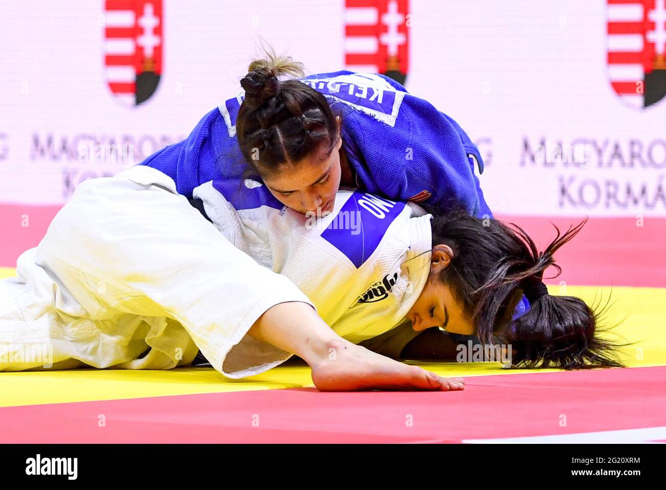 BUDAPEST, HUNGARY - JUNE 7: Gefen Primo of Israel, Diyora Keldiyorova ...