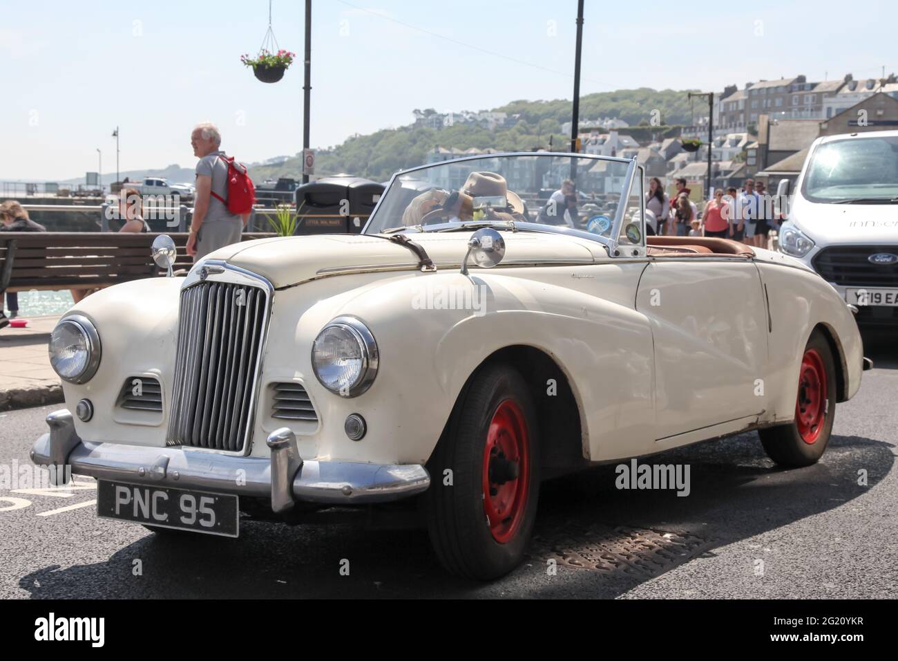 A 1950 Sunbeam Talbot 90 Drophead Coupe driving along harbour, St. Ives ...