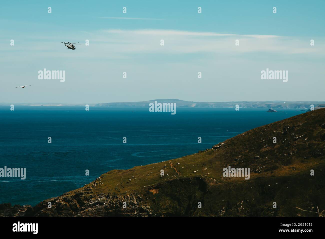 Royal Navy Merlin Helicopter arriving for G7 summit flying over coast ...