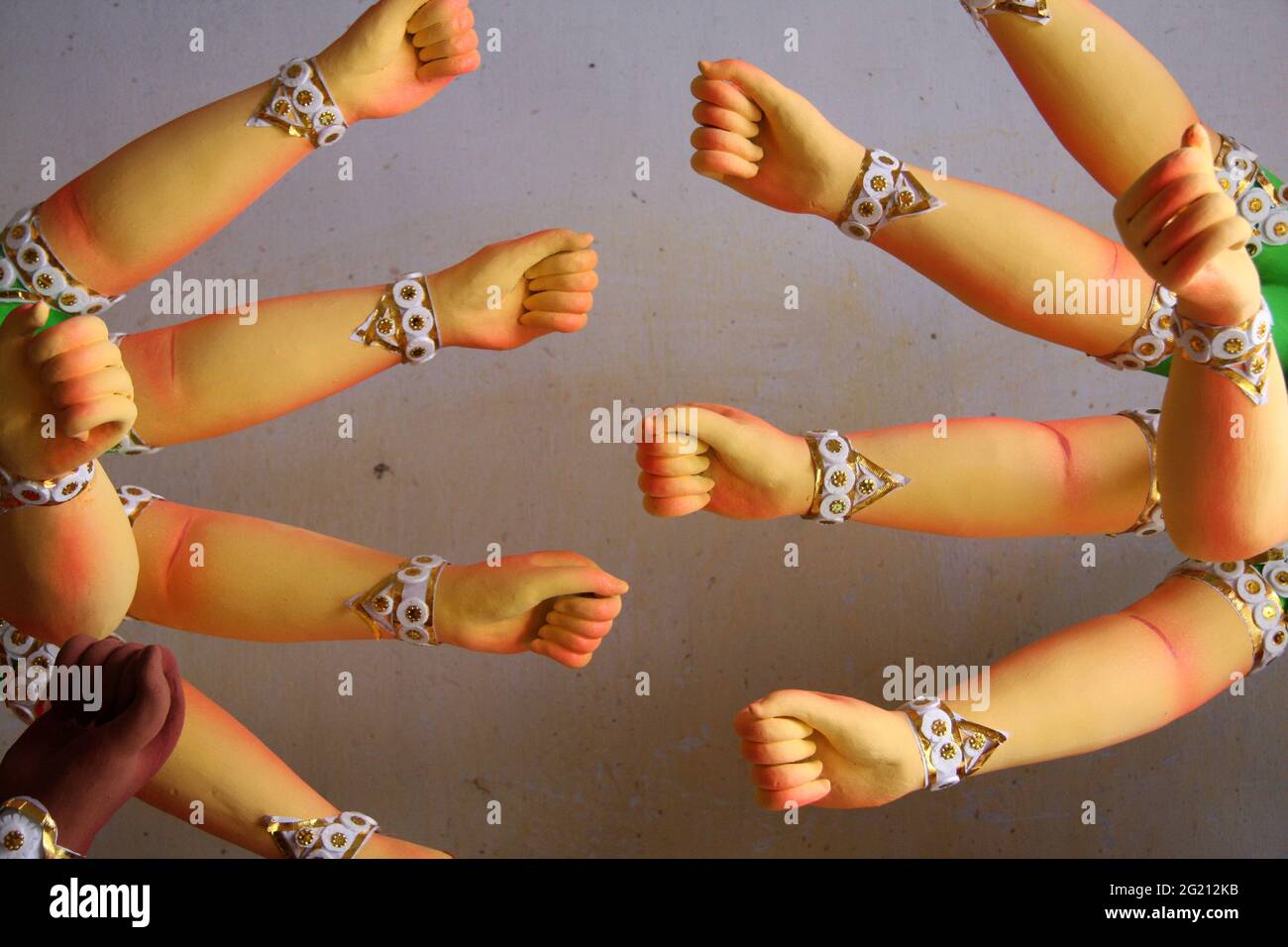 The multiple hands of the Goddess Durga contains the energies of the ...