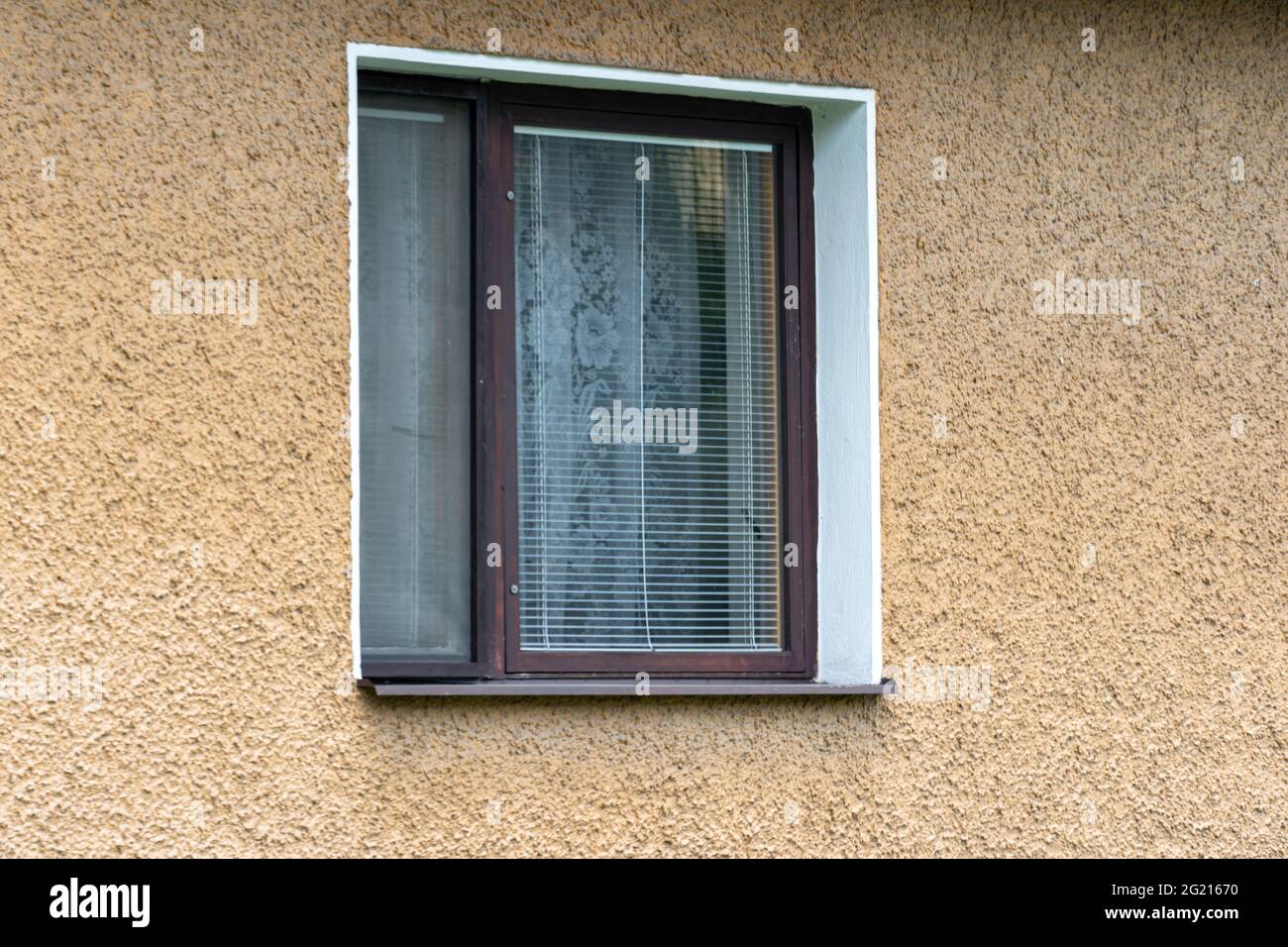 window of a family house with a facade Stock Photo - Alamy