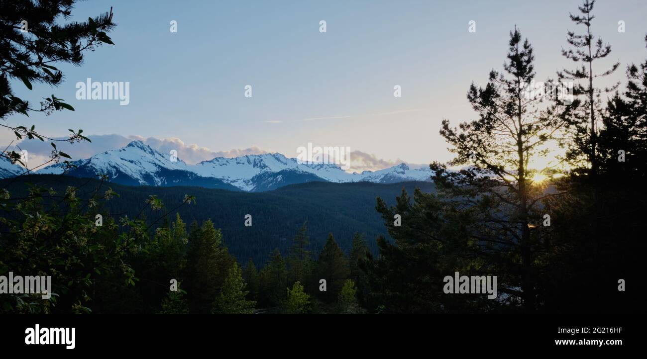 Glaciated peaks of the Tantalus Range near Squamish, BC just as the sun ...