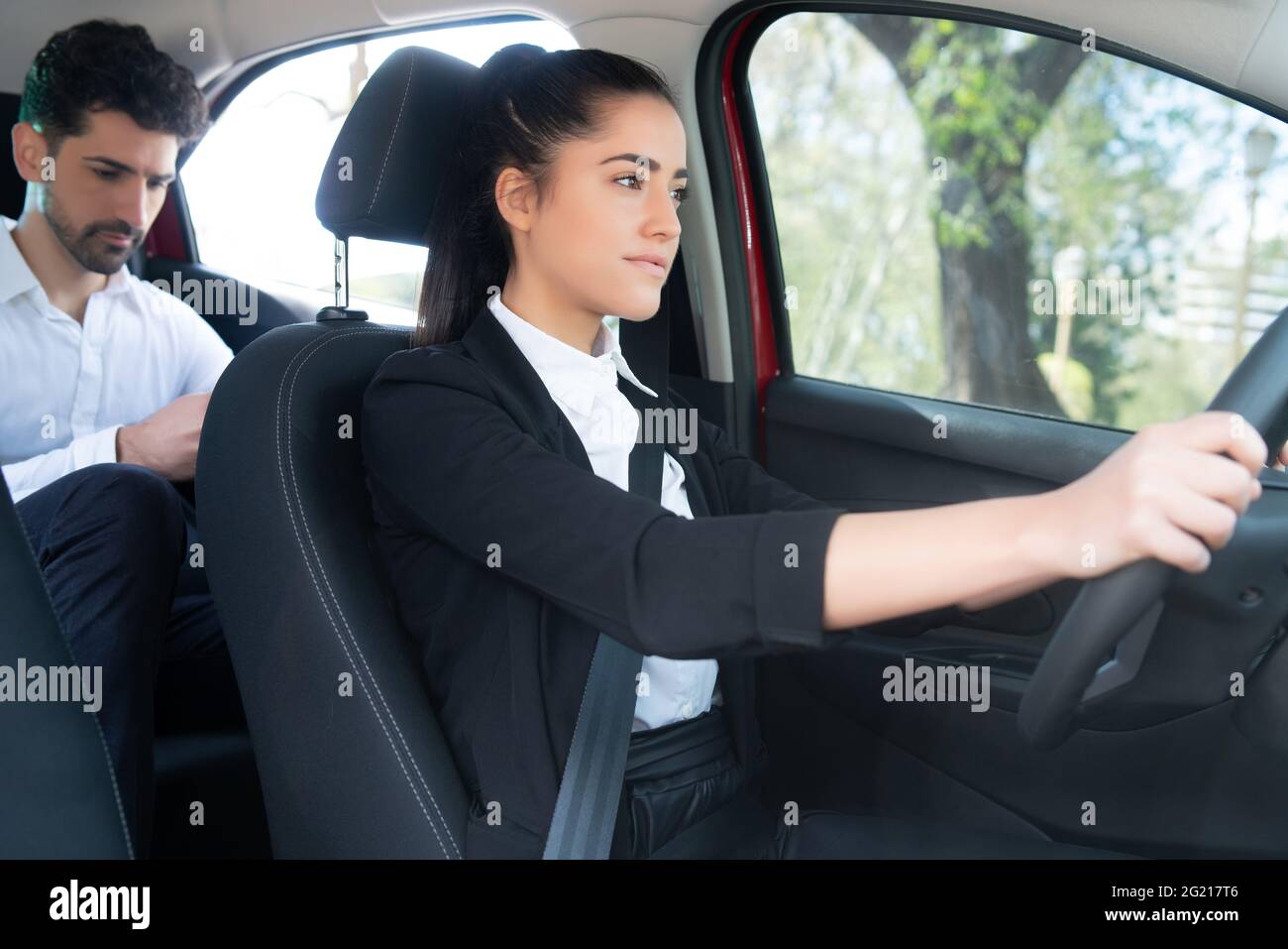 Businessman sitting in cab hi-res stock photography and images - Alamy