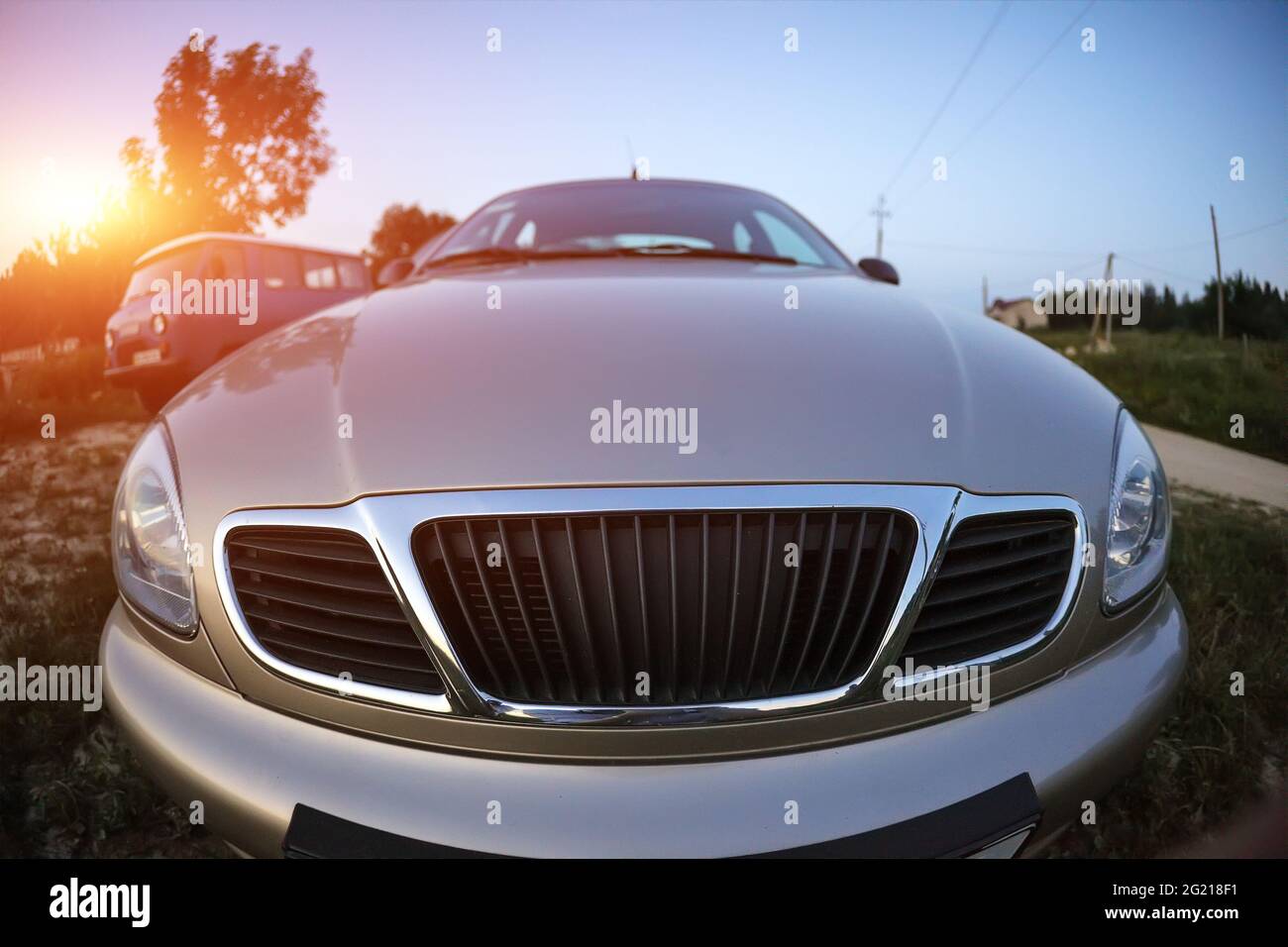 Front-side view of a car on nature background. Fisheye shoot Stock ...