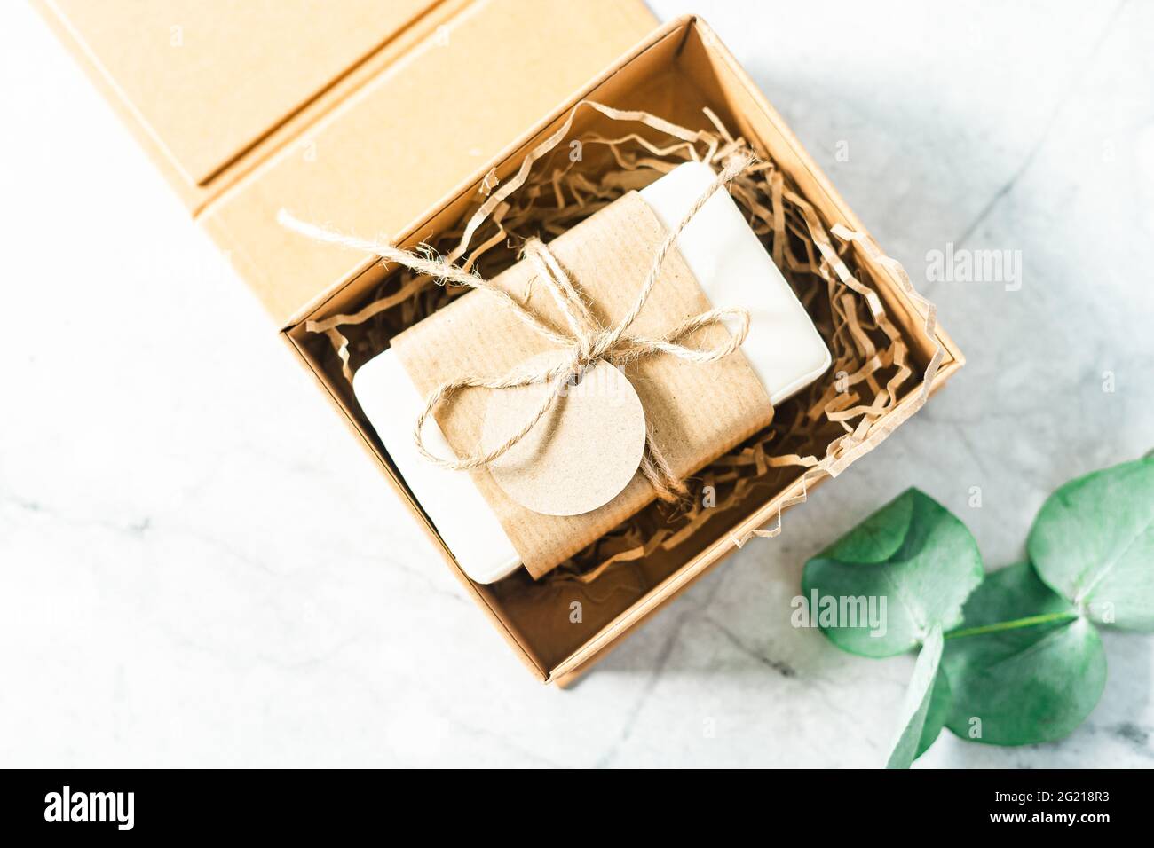 Natural soap in gift box with empty mockup tag Stock Photo - Alamy