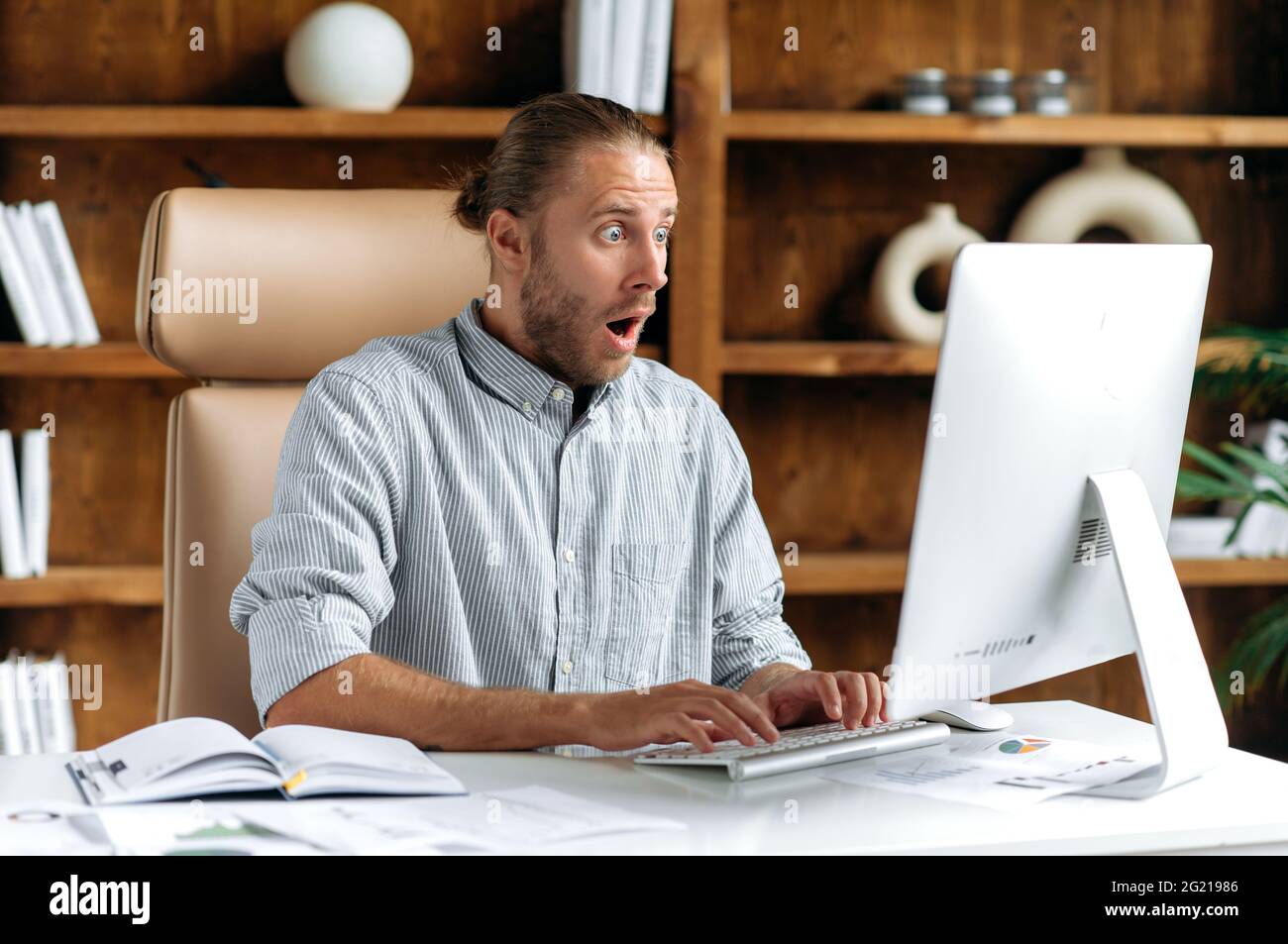 Man Crying At Computer