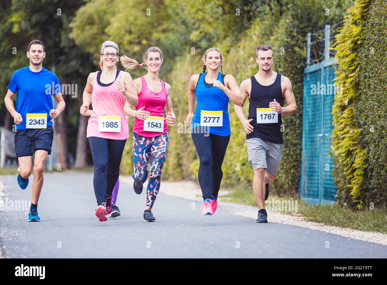 Marathon athletes competing in race Stock Photo - Alamy
