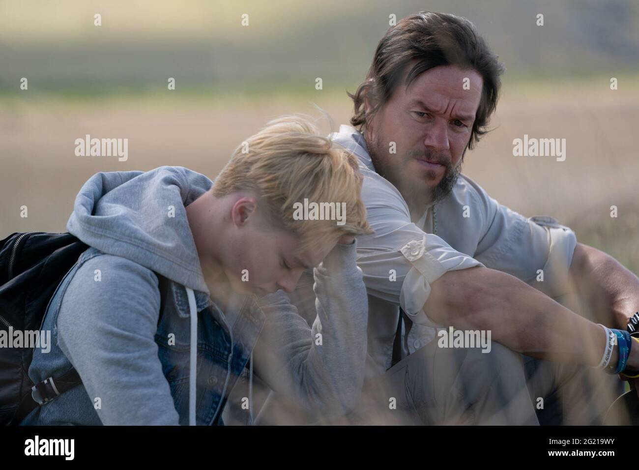 JOE BELL, from left: Reid Miller, Mark Wahlberg, 2020. ph: Quantrell D ...