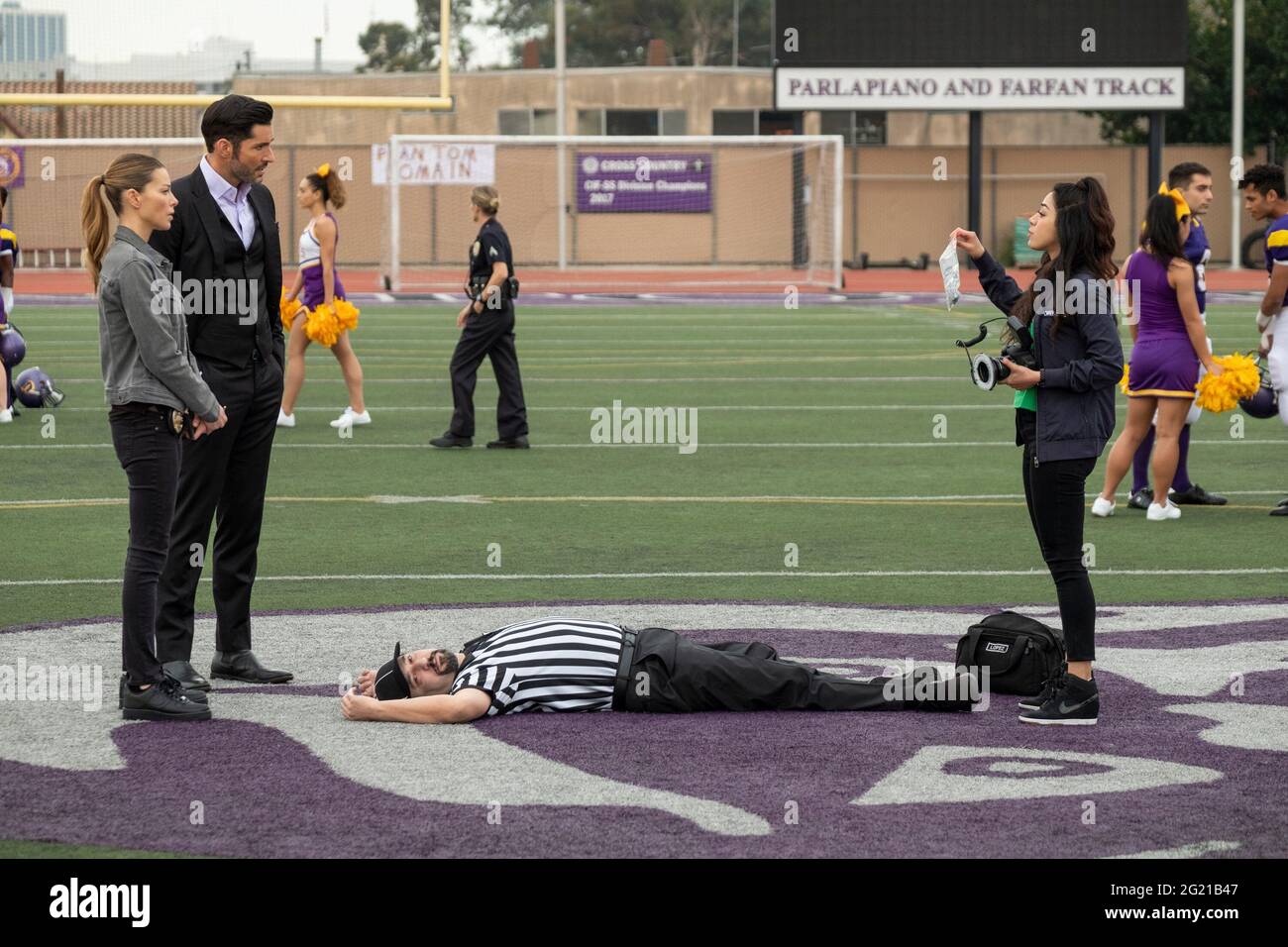 LUCIFER, front, standing: Lauren German, Tom Ellis, Aimee Garcia ...