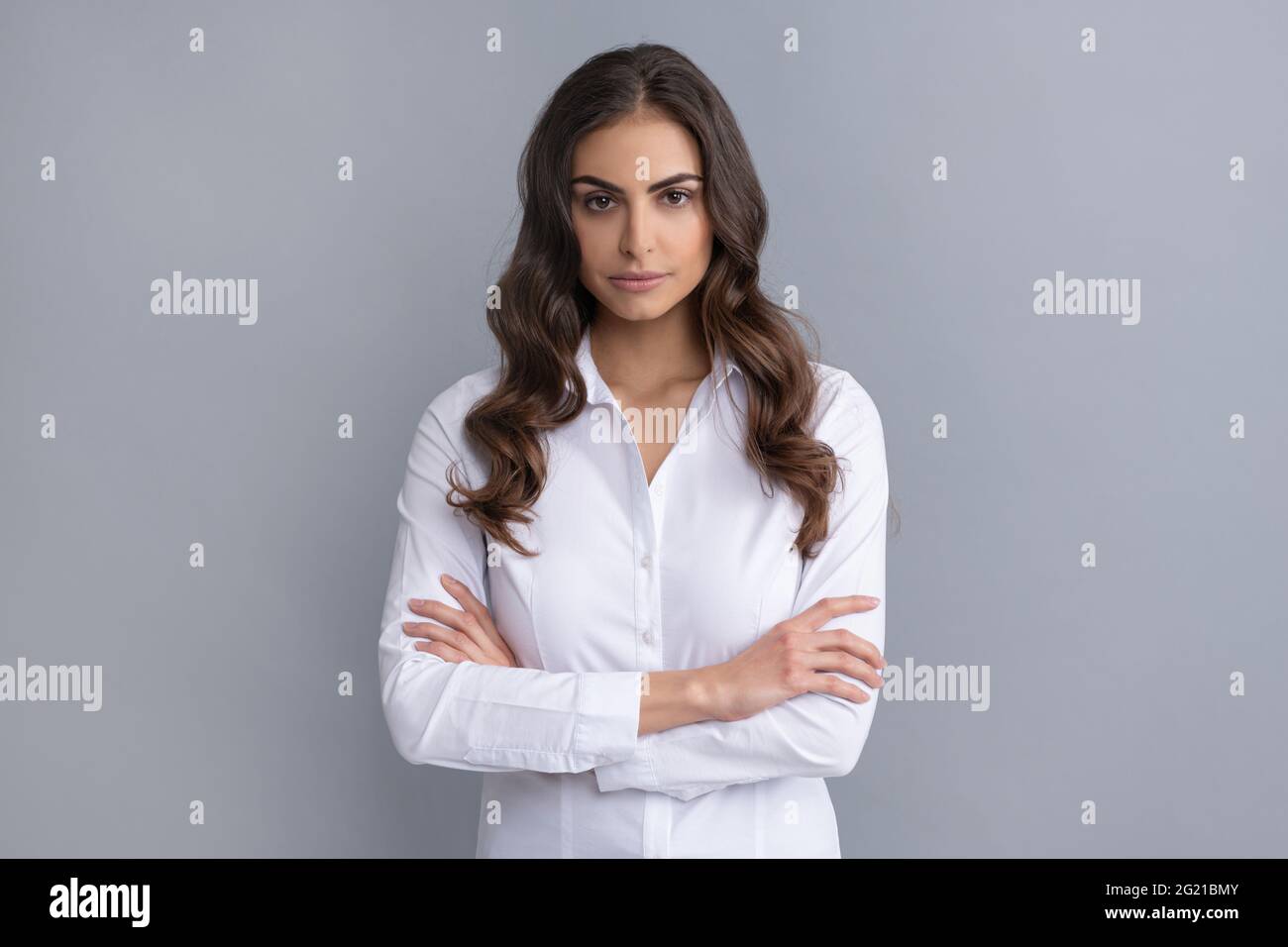 Serious confident business woman hold arms crossed grey, confidence ...