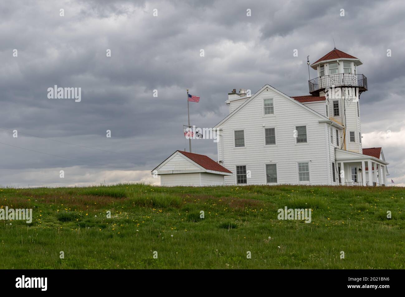 Point Judith Lighthouse in Narragansett, Rhode Island, on a cloudy day ...