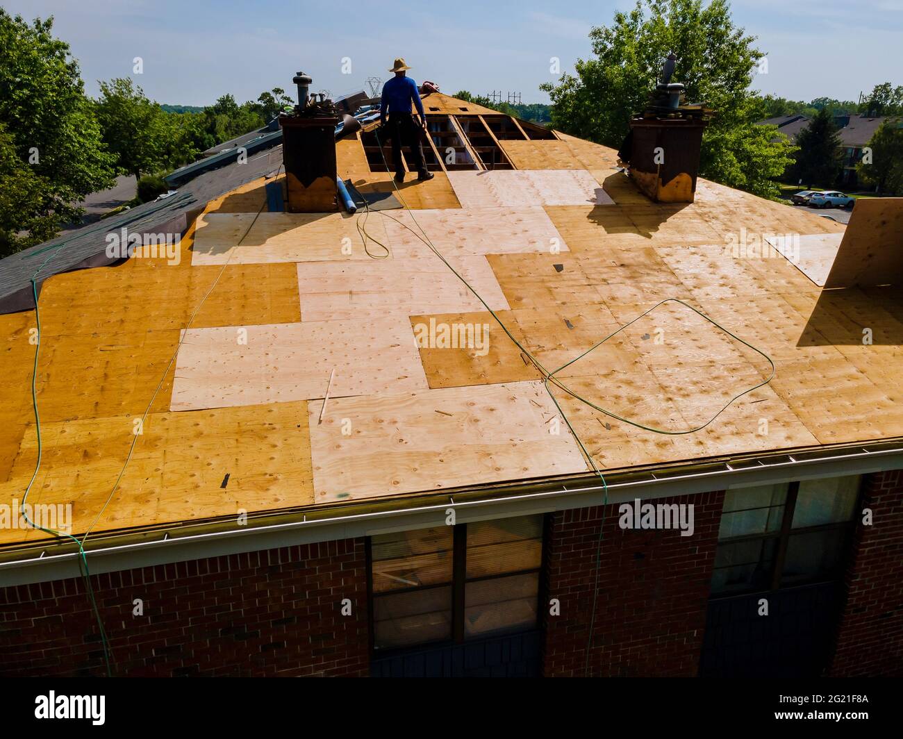 Construction worker on a renovation roof the house installed new ...