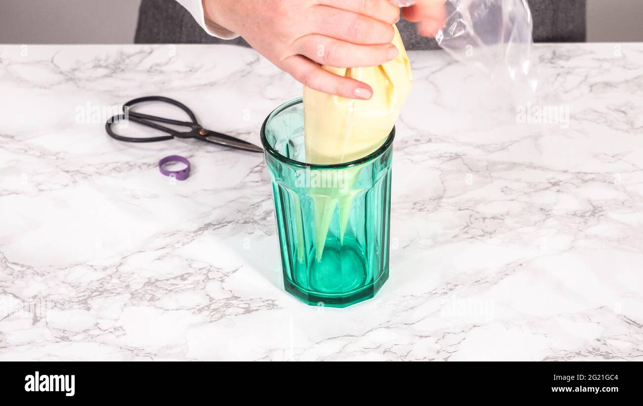 Step by step. Transferring pancake batter into a piping bag to prepare ...