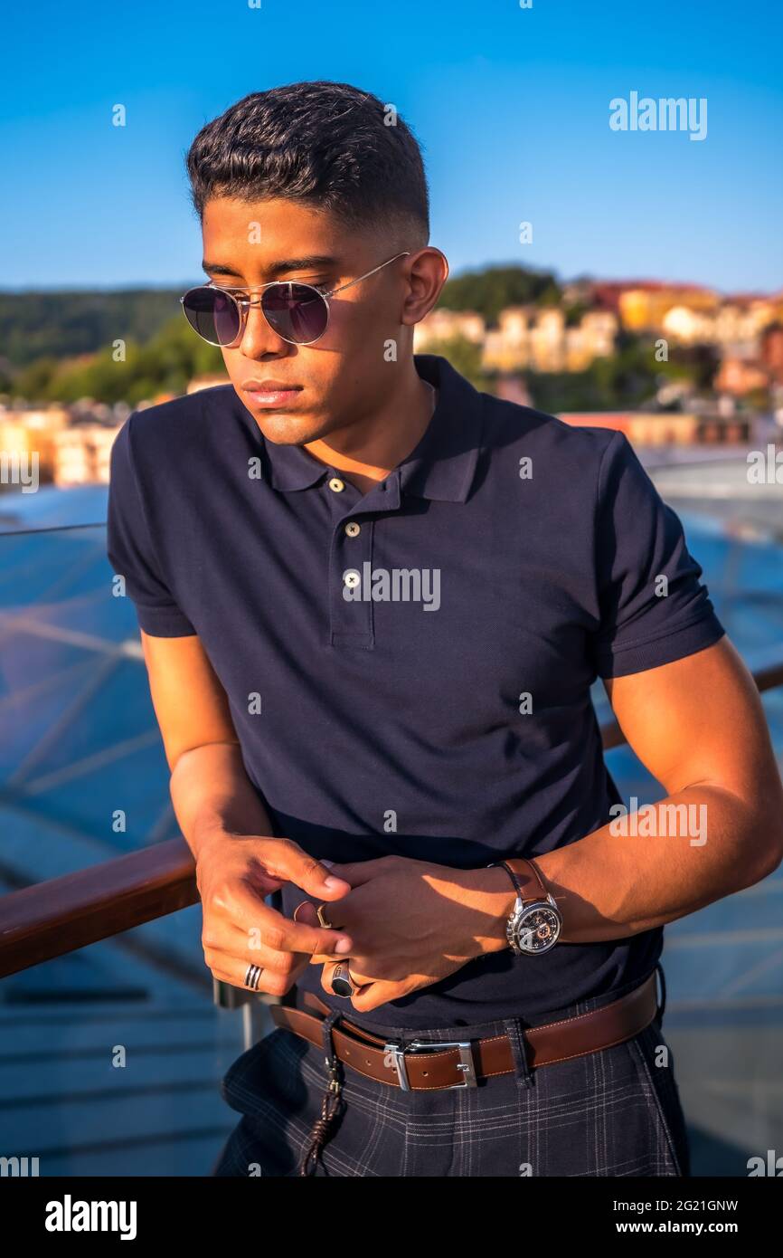 Young Hispanic male posing in the city of San Sebastian Stock Photo - Alamy