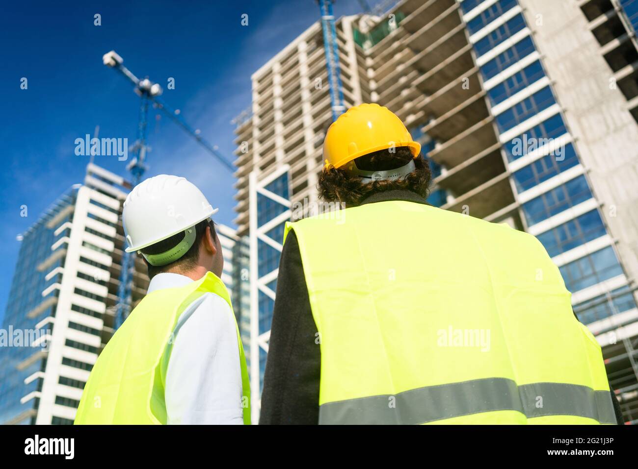 Architects or civil engineers visiting construction site Stock Photo ...